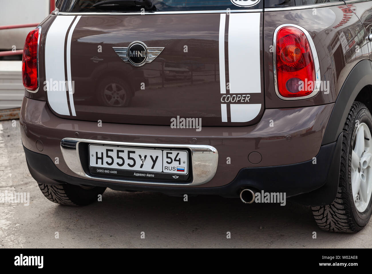 Novosibirsk, Russia - 06.26.2019: An expensive car, a female model of a ...