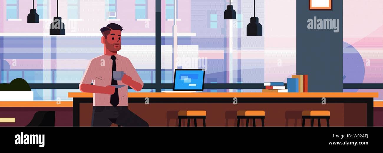 Businessman Sitting On Chair At Bar Counter With Laptop Coffee Break