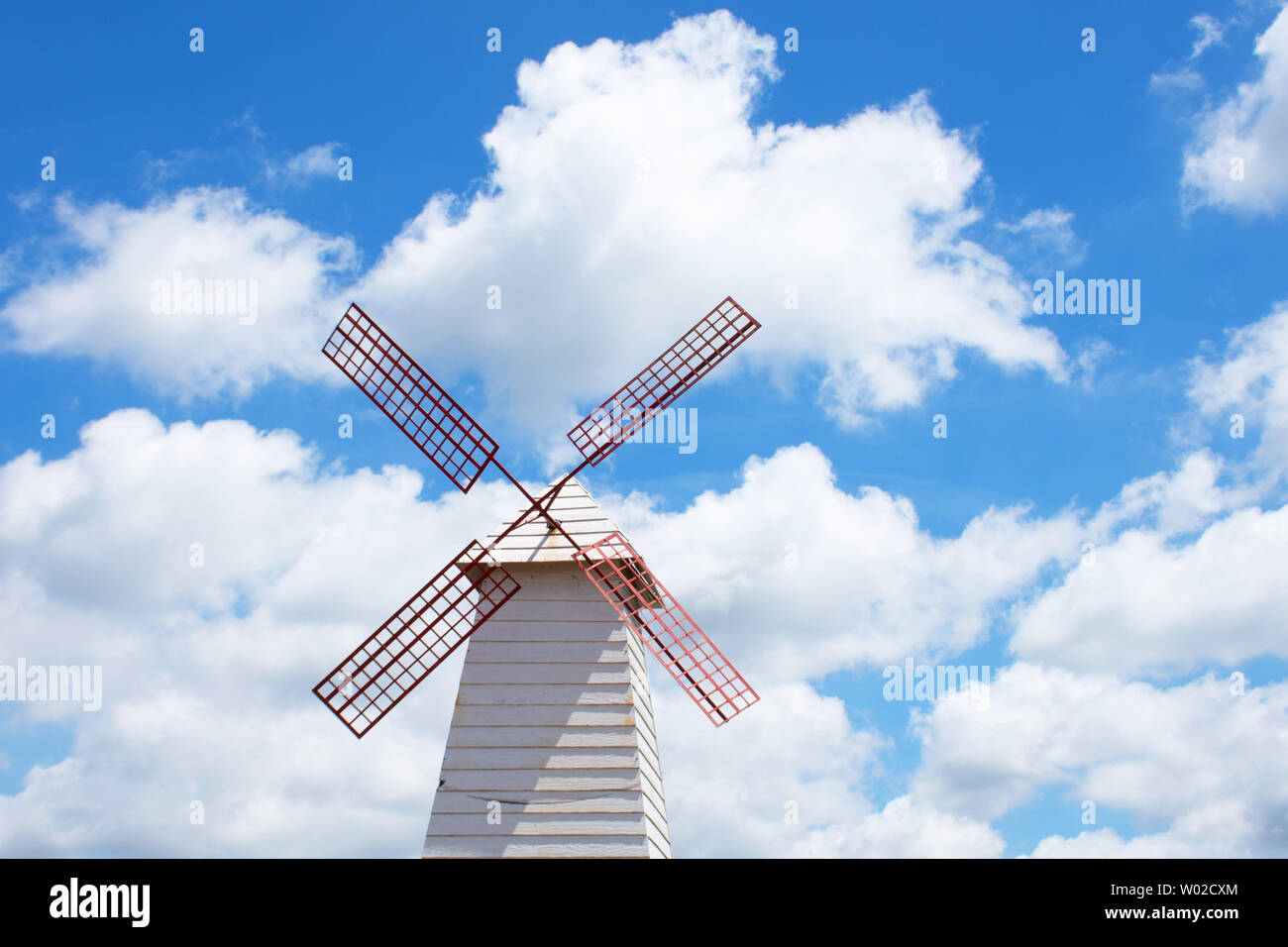 Home wind turbines and bright blue sky Stock Photo - Alamy