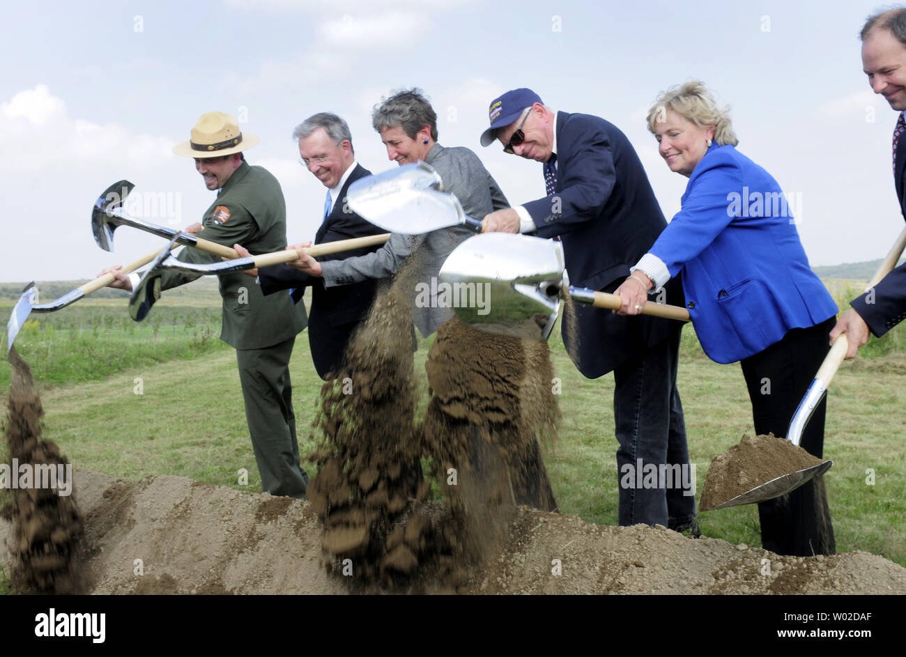 Secretary of the Interior, Sally Jewell, third for the left, leads ...