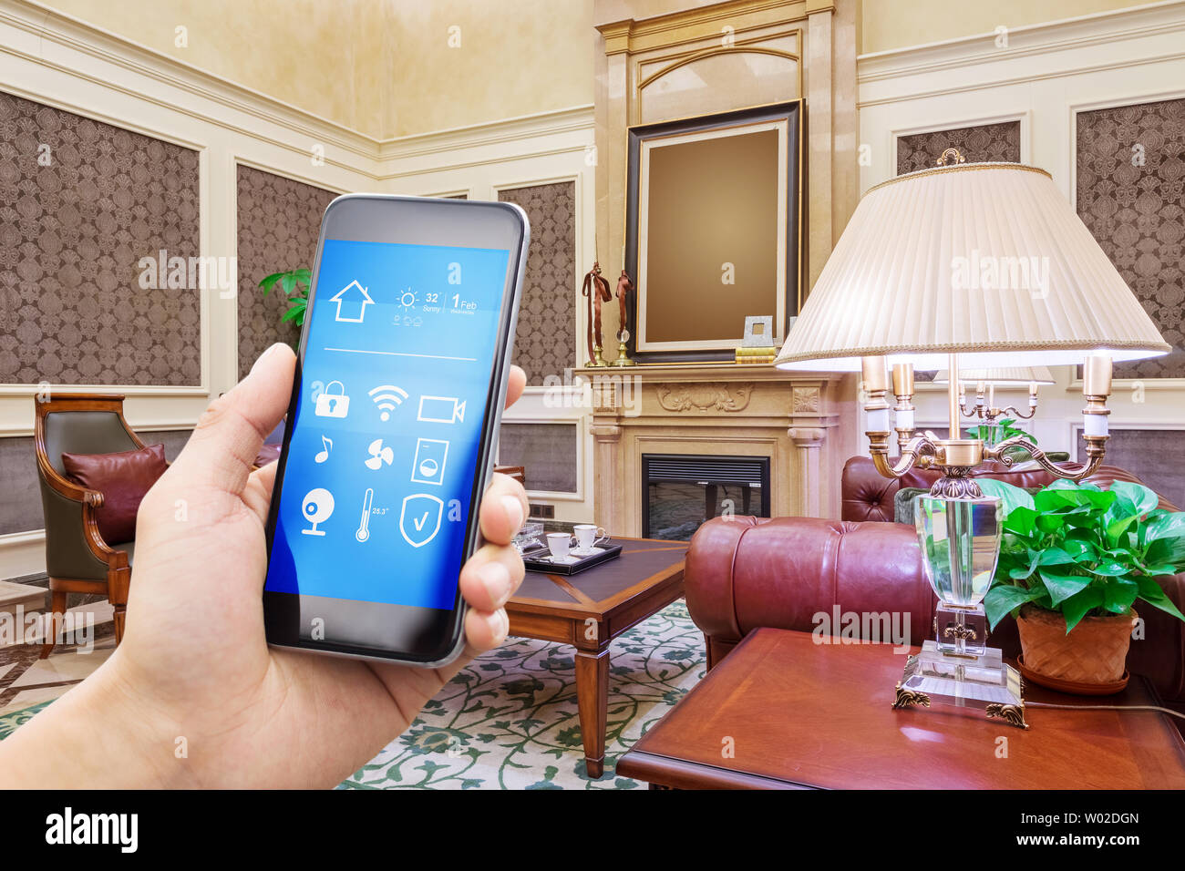 Mobile phone with modern living room Stock Photo - Alamy