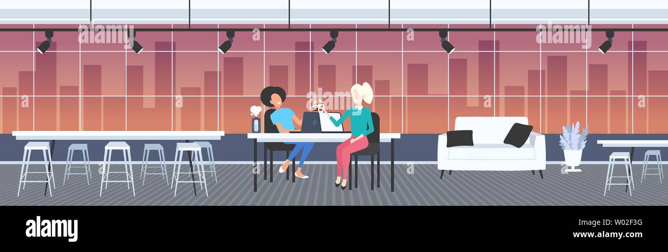 couple businesswomen colleagues discussing during coffee break mix race ...