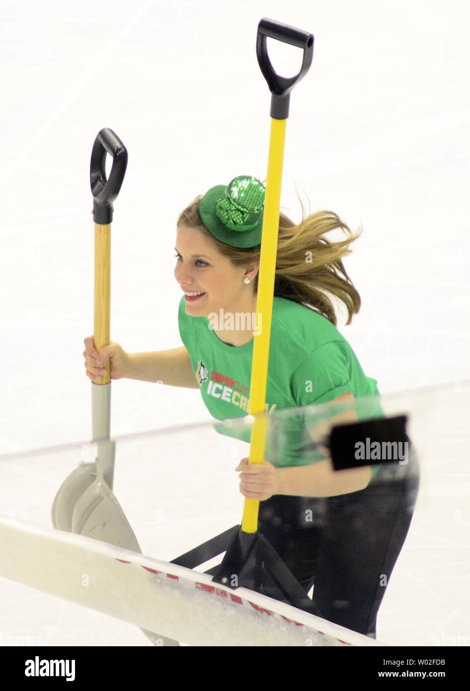 Pittsburgh Penguins Ice Crew member dons green to celebrate St. Patrick ...