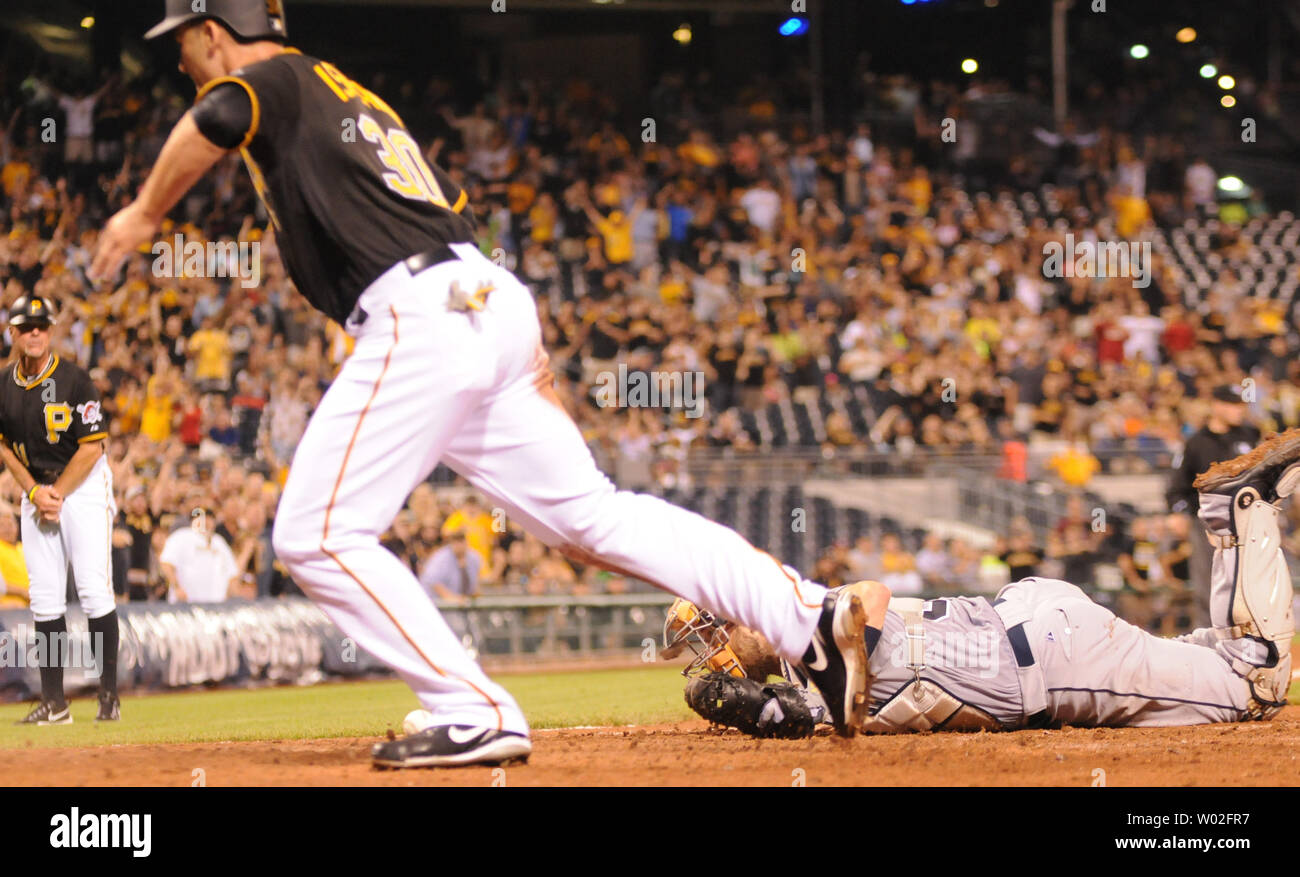 Pittsburgh Pirates first baseman Travis Ishikawa (30) scores as the ...