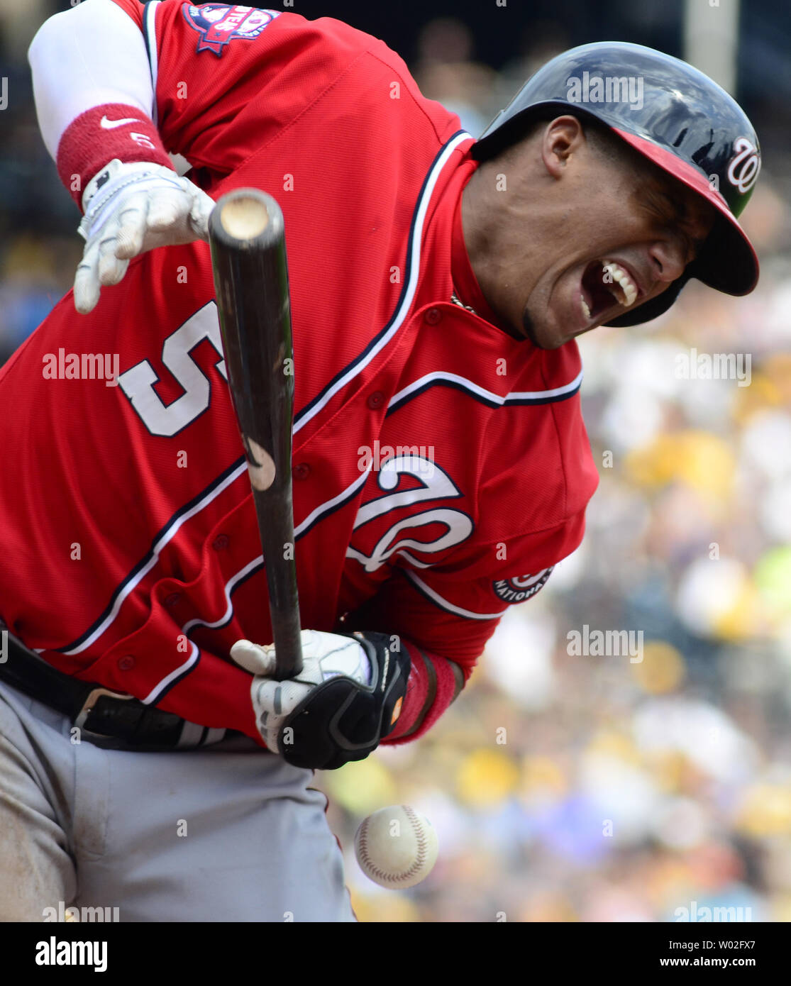 Washington Nationals third baseman Yunel Escobar (5) is hit by a ...