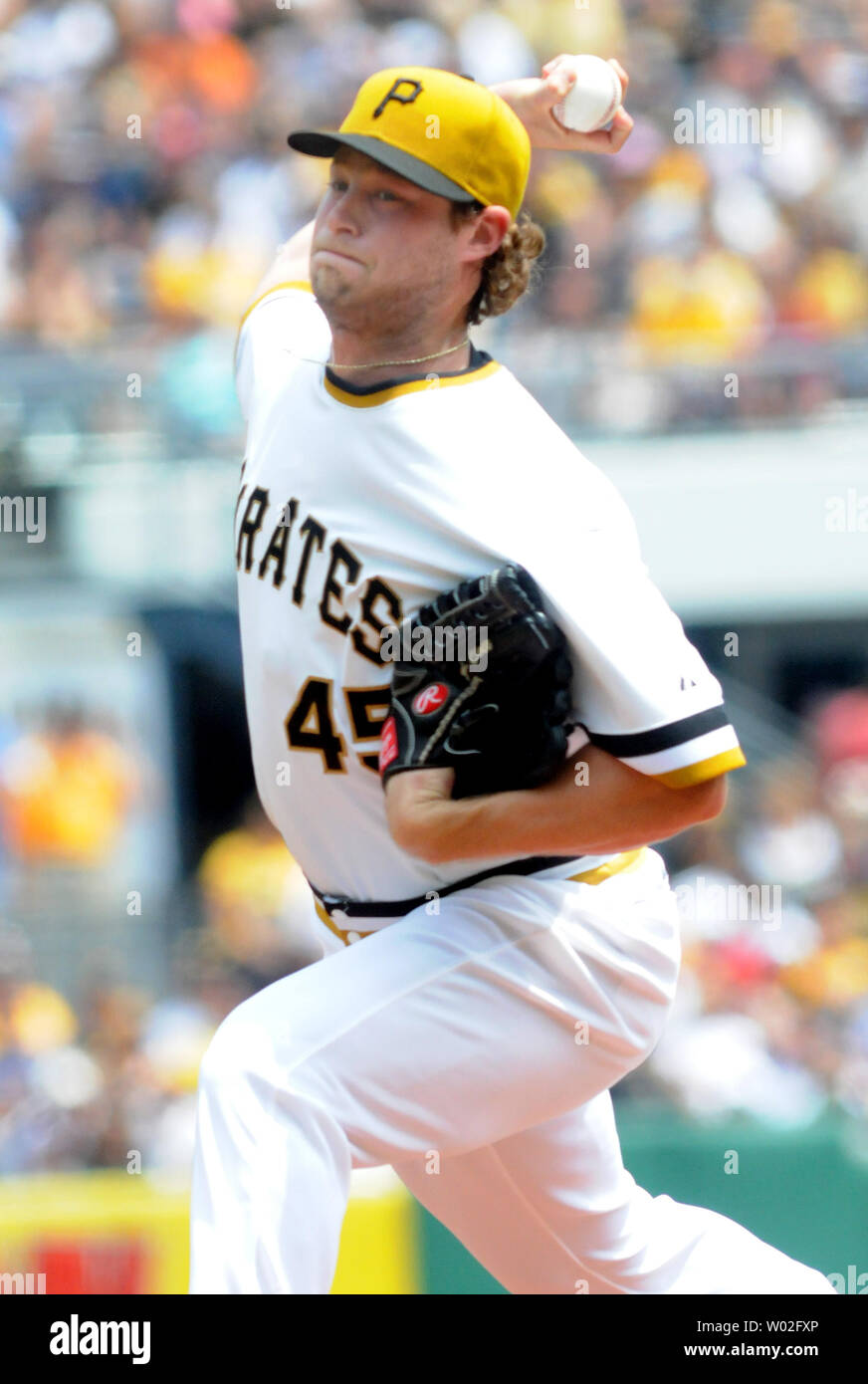 Pittsburgh Pirates starting pitcher Gerrit Cole (45) records the win as ...
