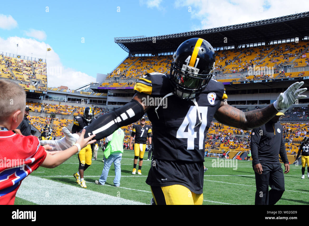 Pittsburgh Steelers cornerback Antwon Blake (41) greets young fans on ...