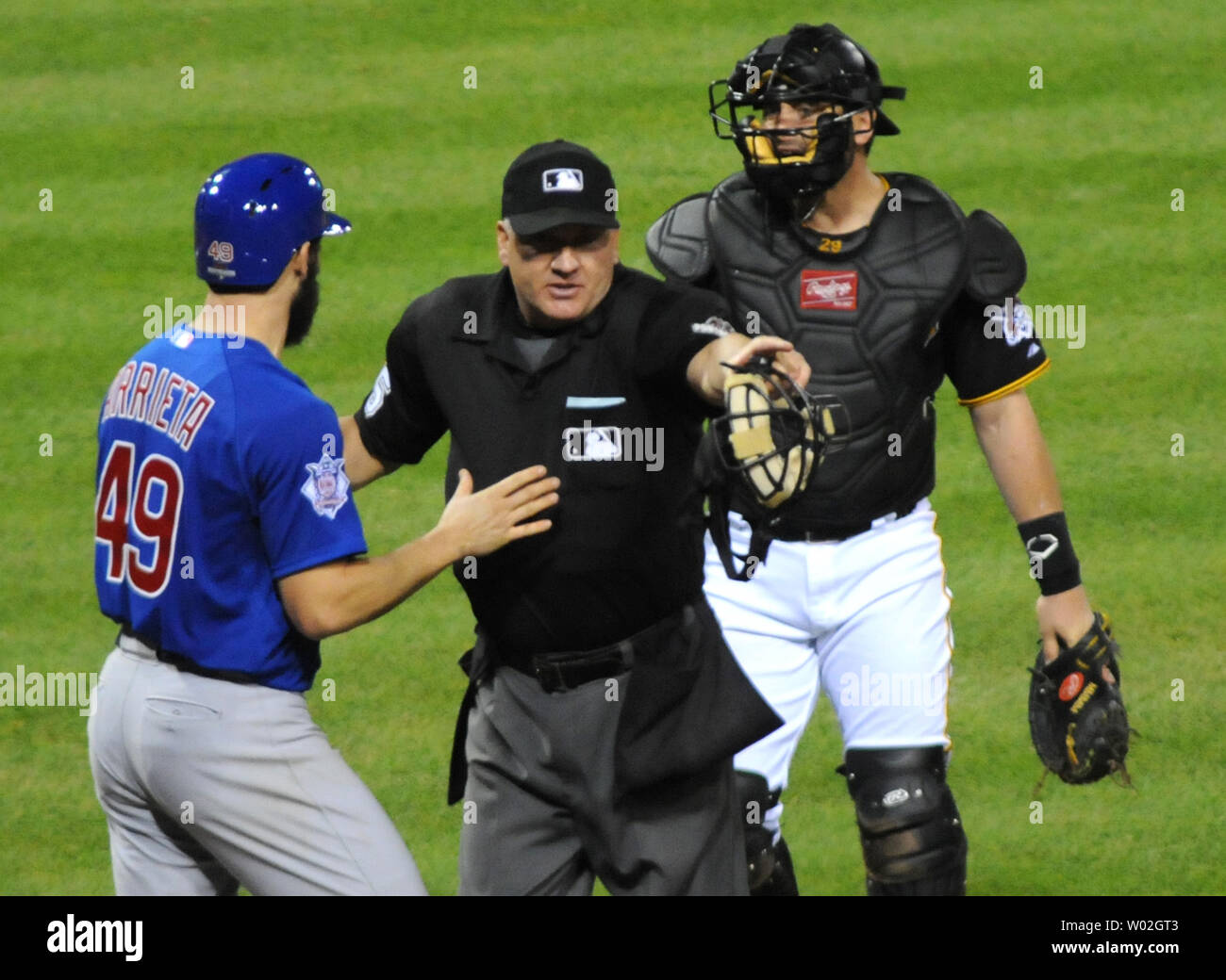 Home plate umpire Jeff Nelson steps in-between Pittsburgh Pirates ...