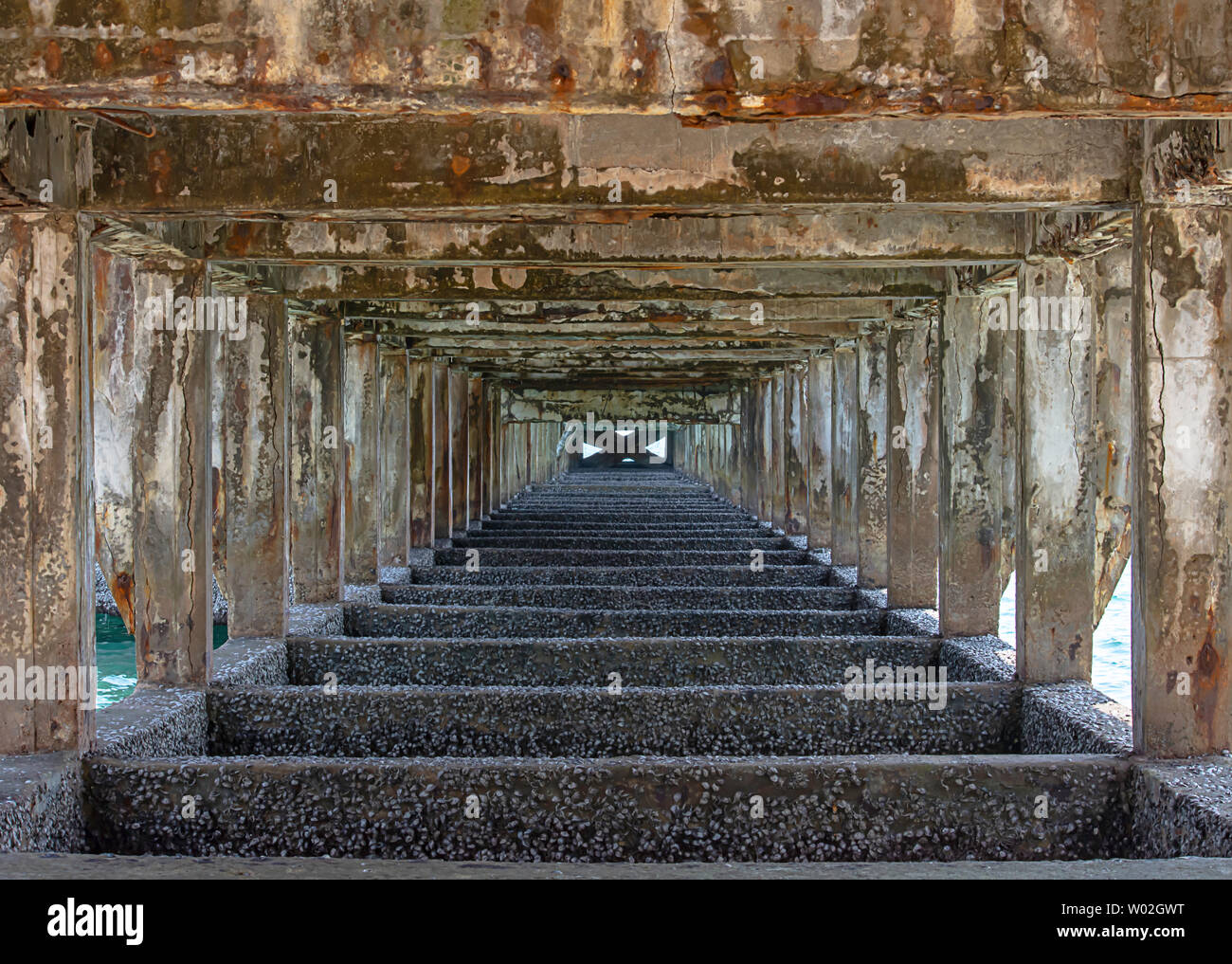 Structural concrete columns and beams under the bridge was damaged at ...