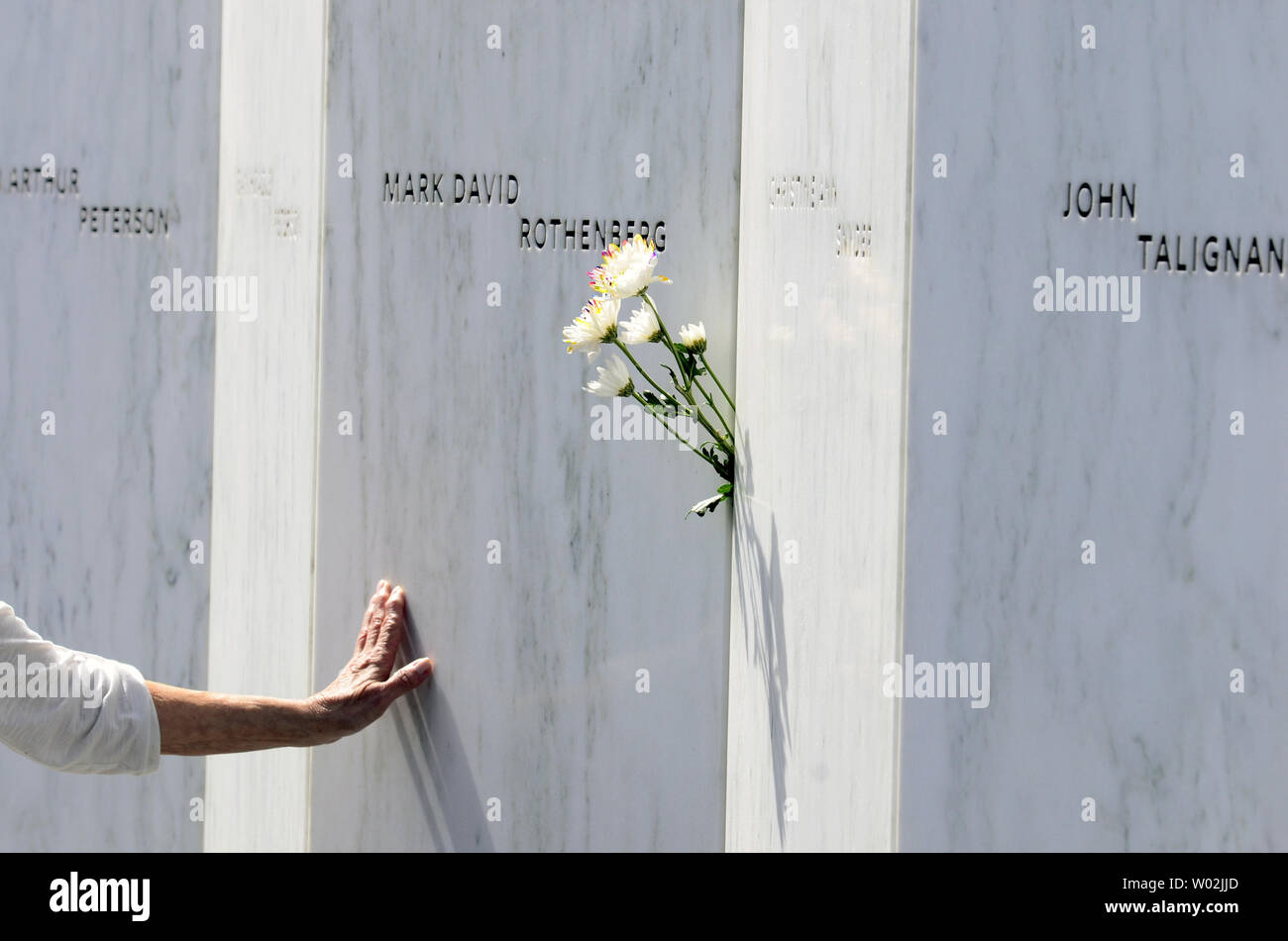 A visitor to the Wall of Names at the Flight 93 National Memorial ...