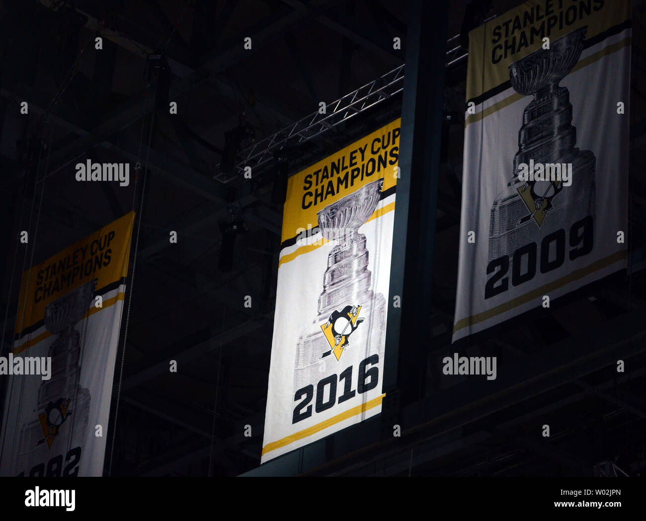 The 2016 Stanley Cup banner joins the other championship banners in the ...