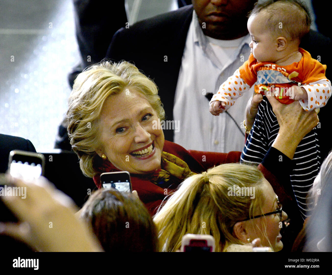 Democratic presidential candidate Hillary Clinton poses for a cell ...