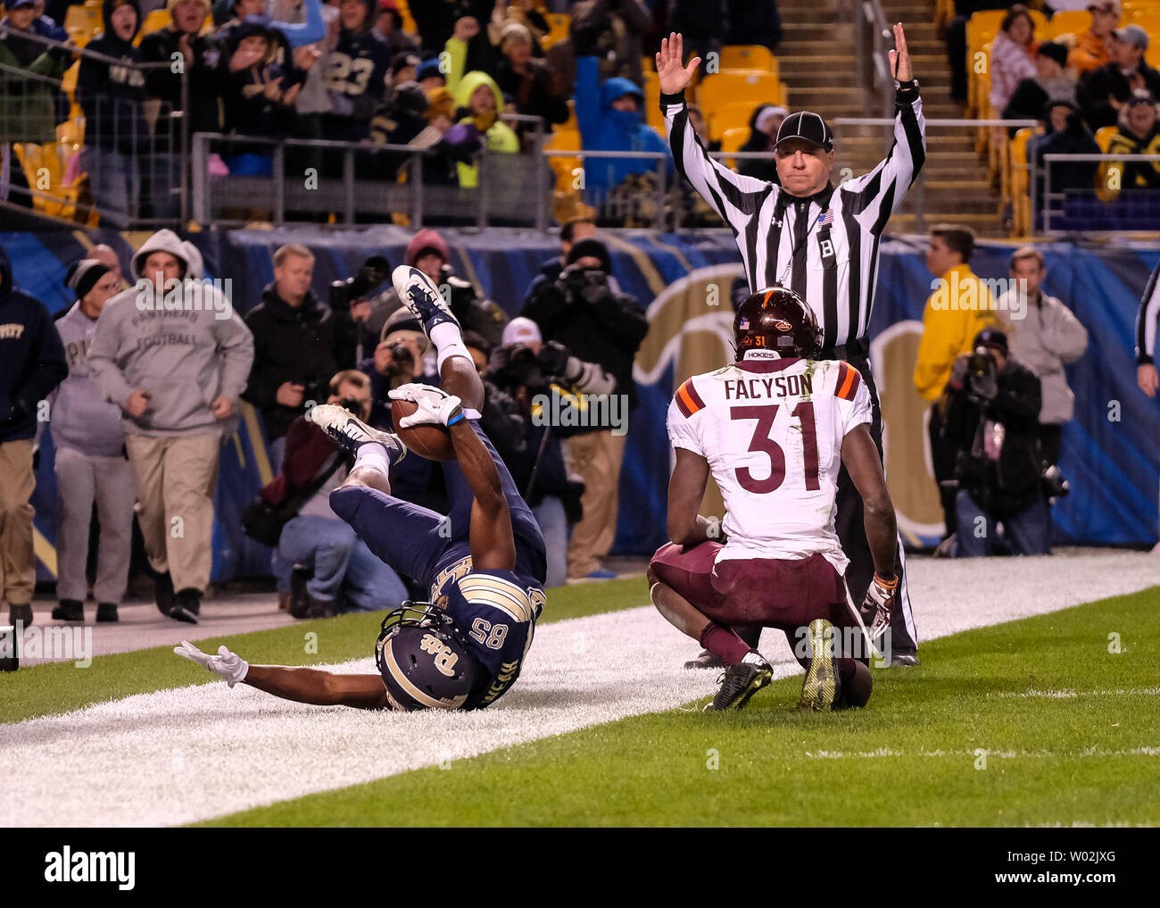 Pittsburgh Panthers wide receiver Jester Weah (85) is upended by ...