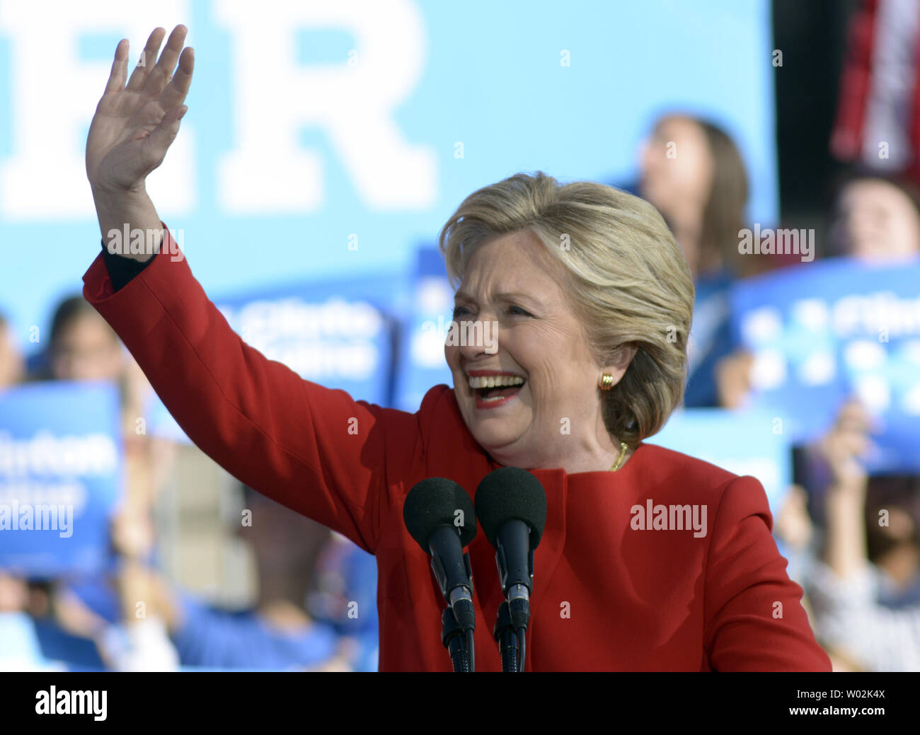 Democratic presidential candidate Hillary Clinton waves to supporters ...