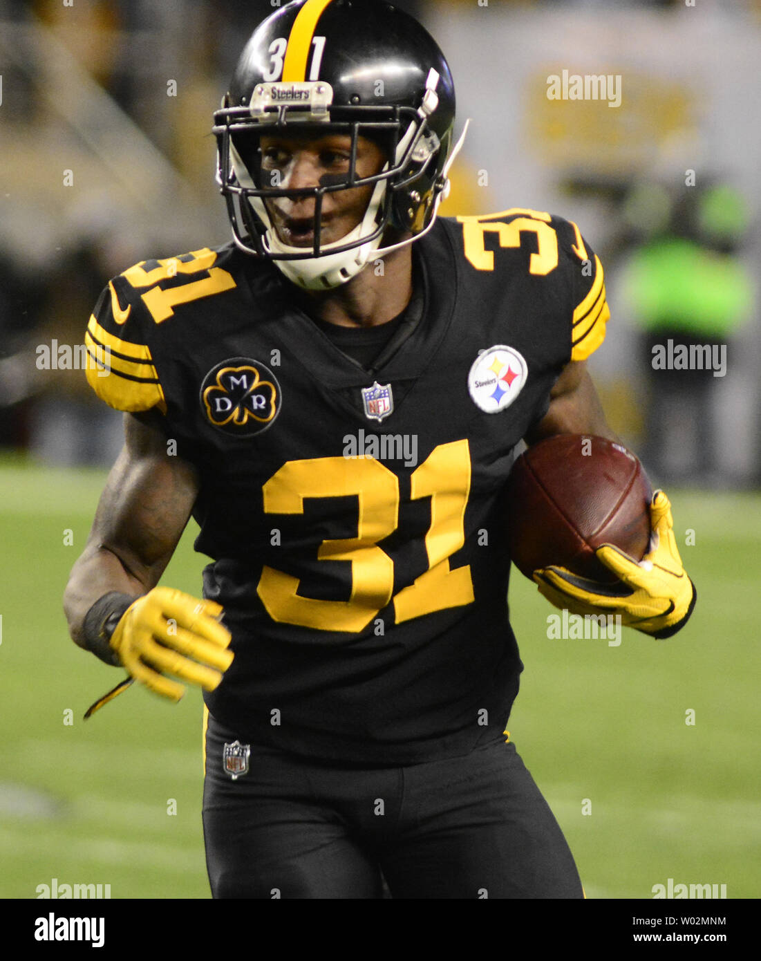 Pittsburgh Steelers defensive back Mike Hilton (31) returns his ...