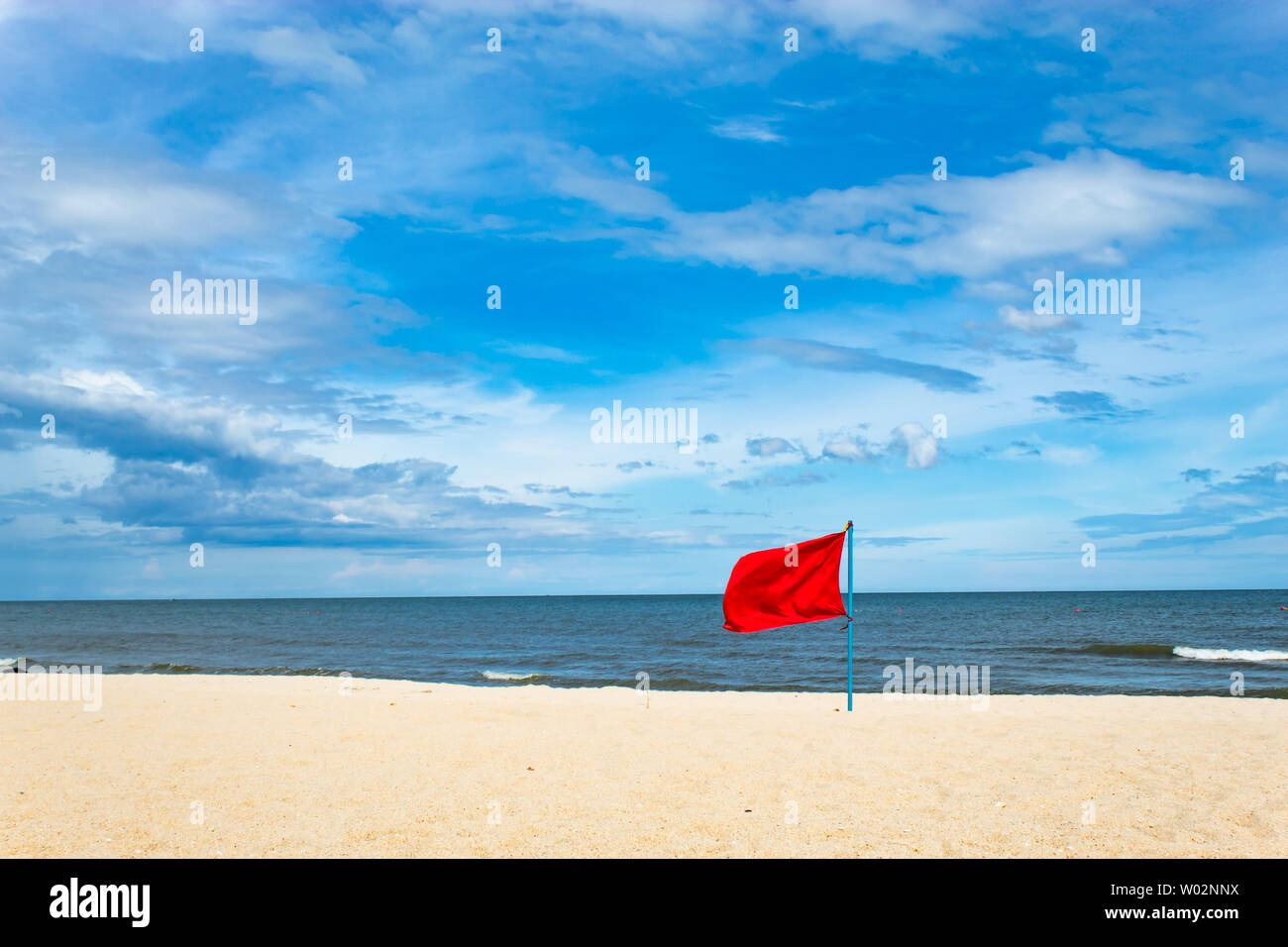 Australian red beach flag hi-res stock photography and images - Alamy