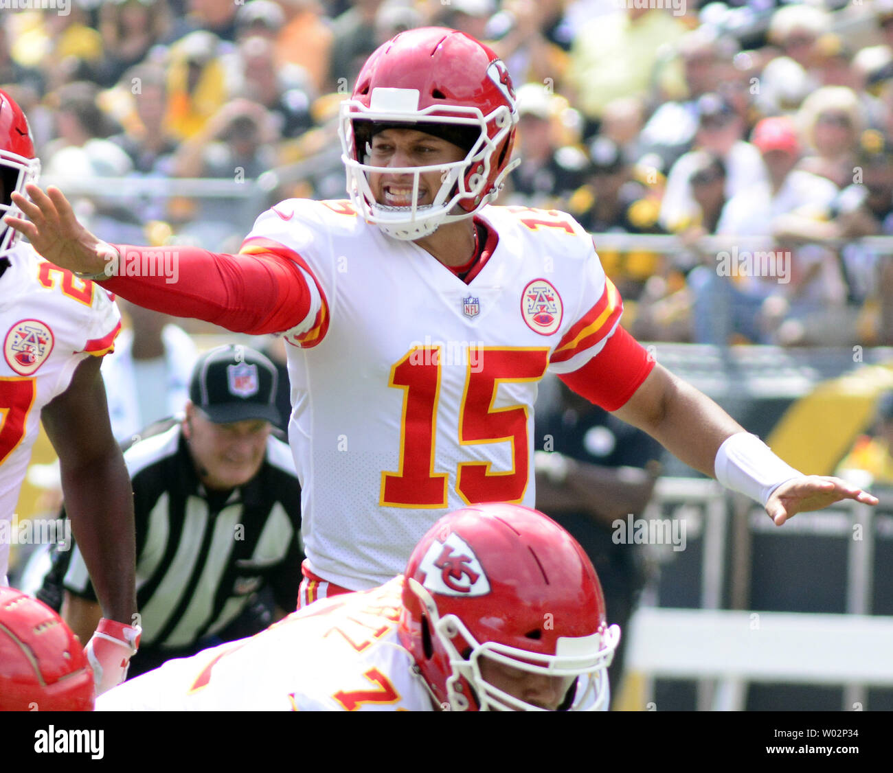 Kansas City Chiefs quarterback Patrick Mahomes (15) signals to his line ...