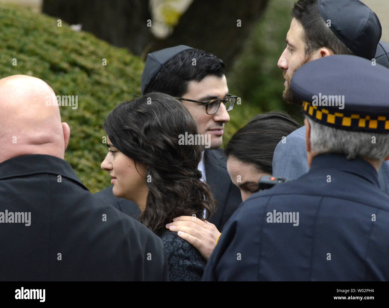Family members for Rose Mallinger, age 97 pause behind the hearse ...