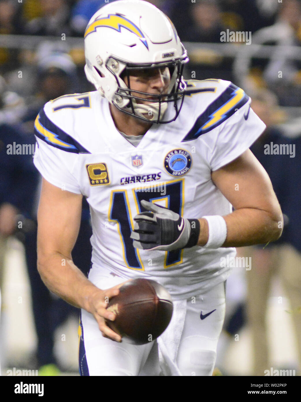 Los Angeles Chargers quarterback Philip Rivers (17) hands off the ball ...