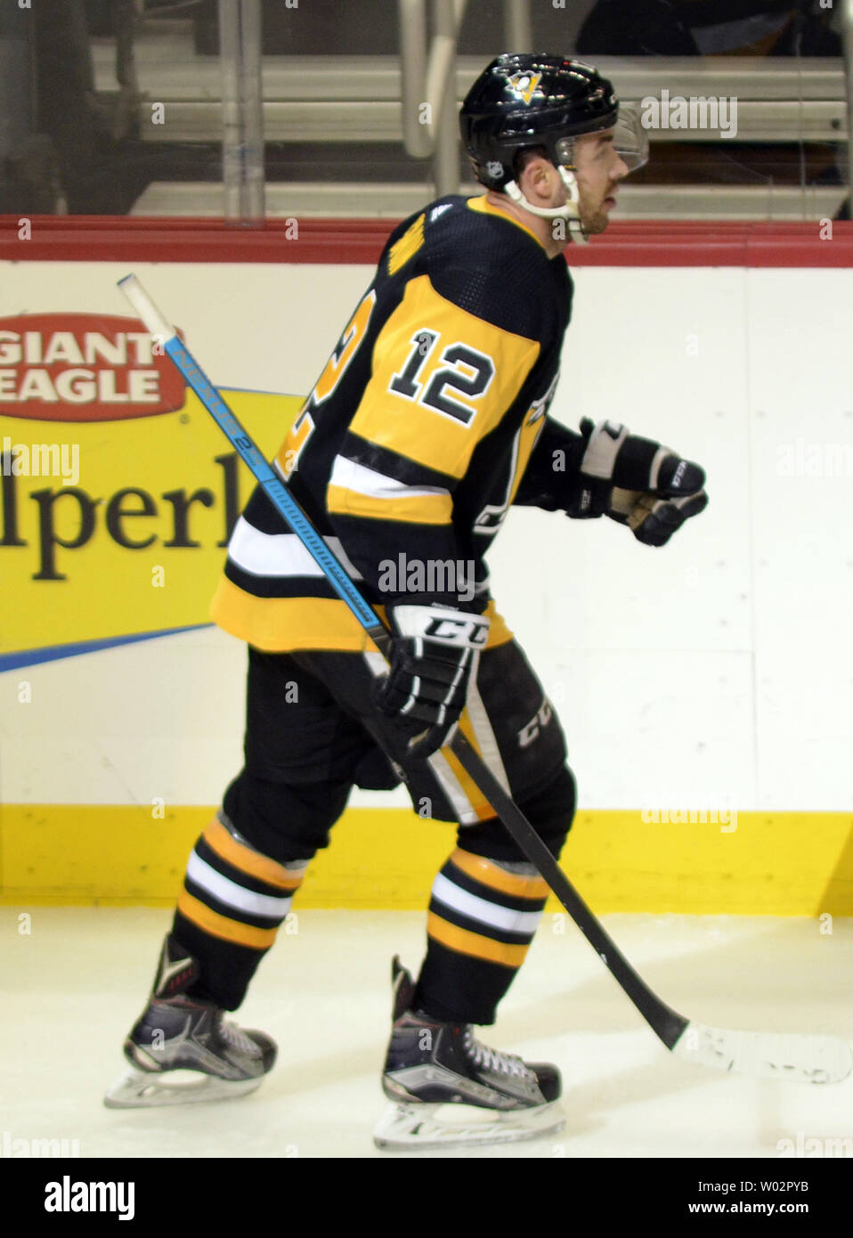 Pittsburgh Penguins center Dominik Simon (12) returns to the bench from ...