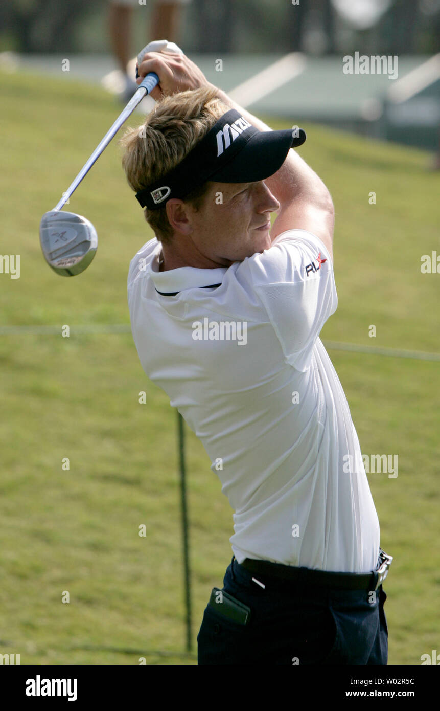 Luke Donald, from High Wycombe, England, watches his shot on the 18th ...