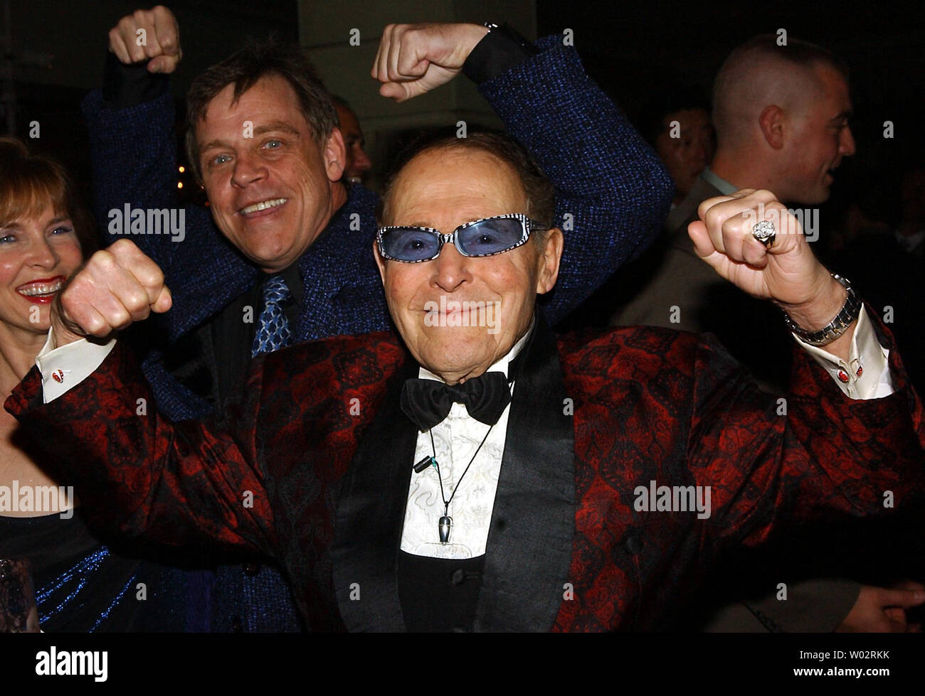 Actor Mark Hamill clowns behind reknown fitness guru Jack LaLanne who ...