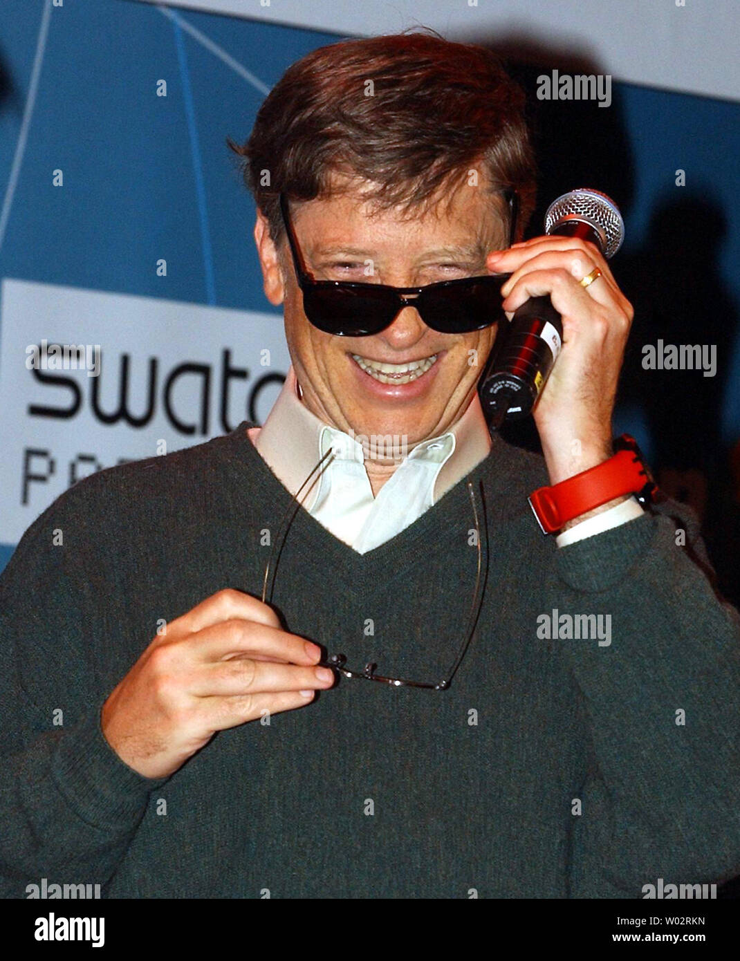 Microsoft Chairman Bill Gates puts on sunglasses at the Oct. 20, 2004 ...