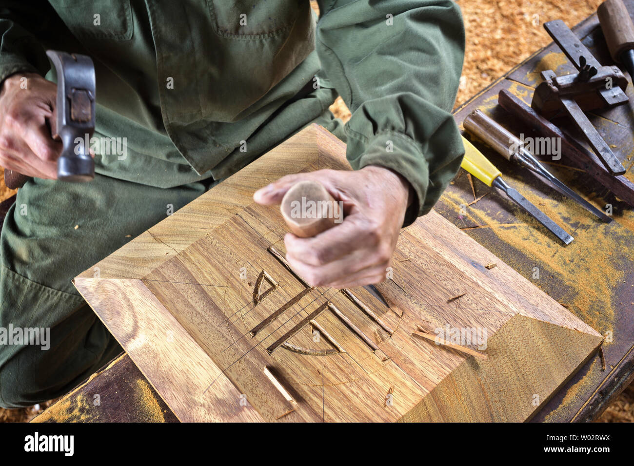 wood chisel carpenter tool working wooden background Stock Photo - Alamy