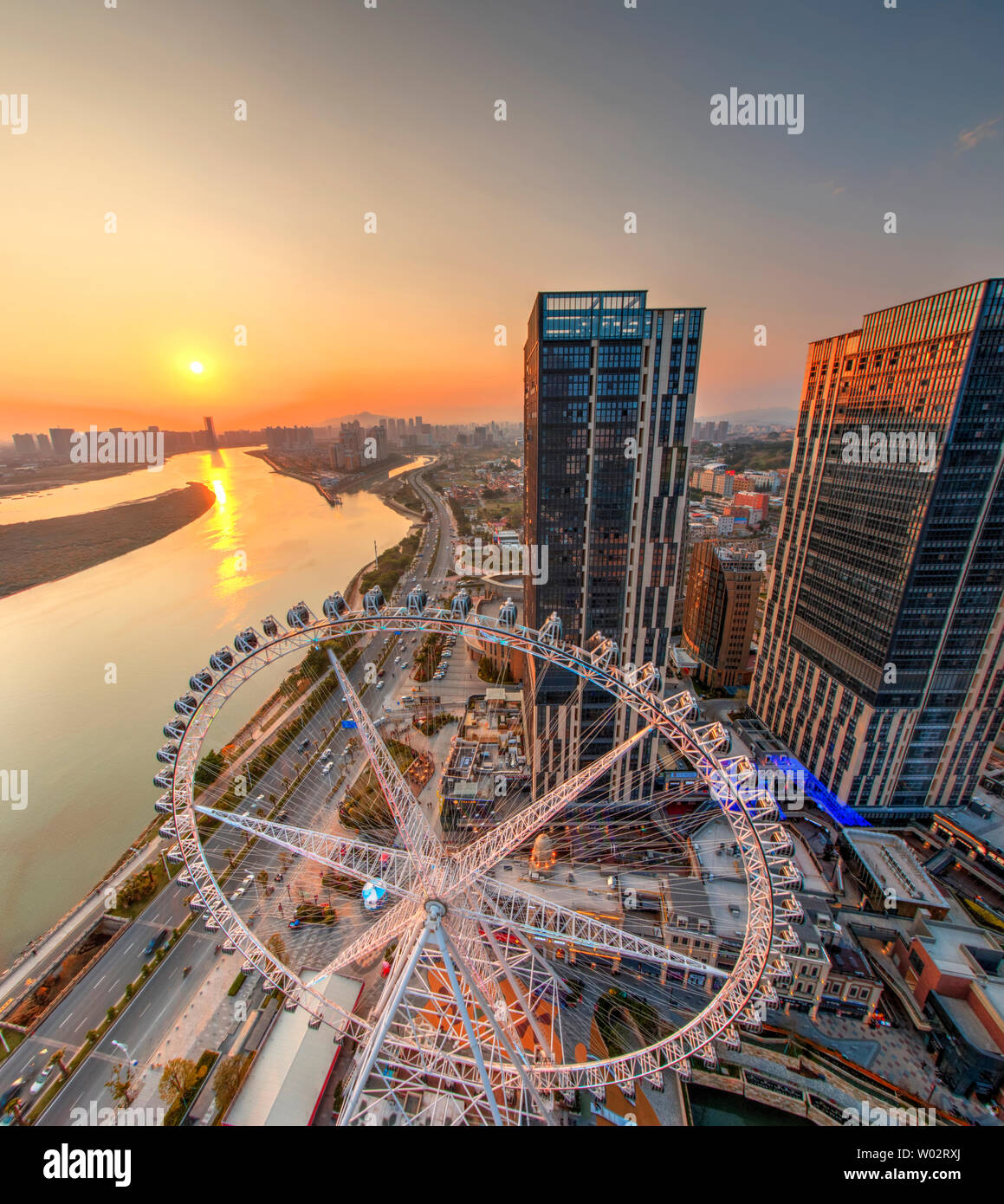 Quanzhou Taihe Square Ferris wheel sunset Stock Photo - Alamy