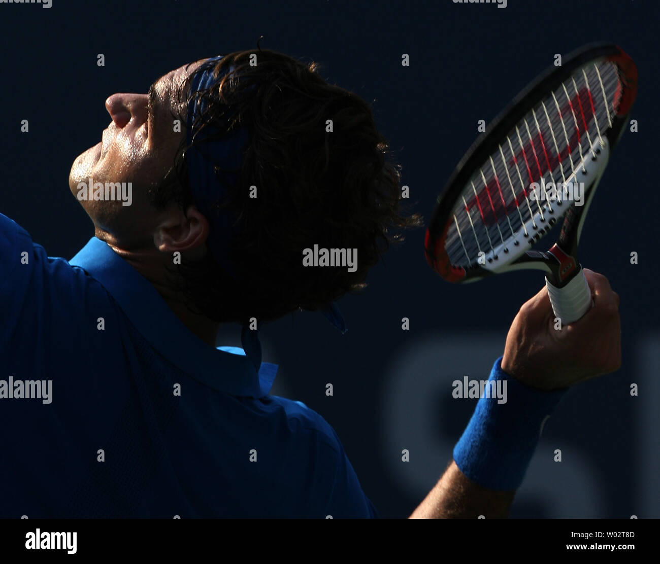 Roger Federer serves in the third set of his semi final match against ...