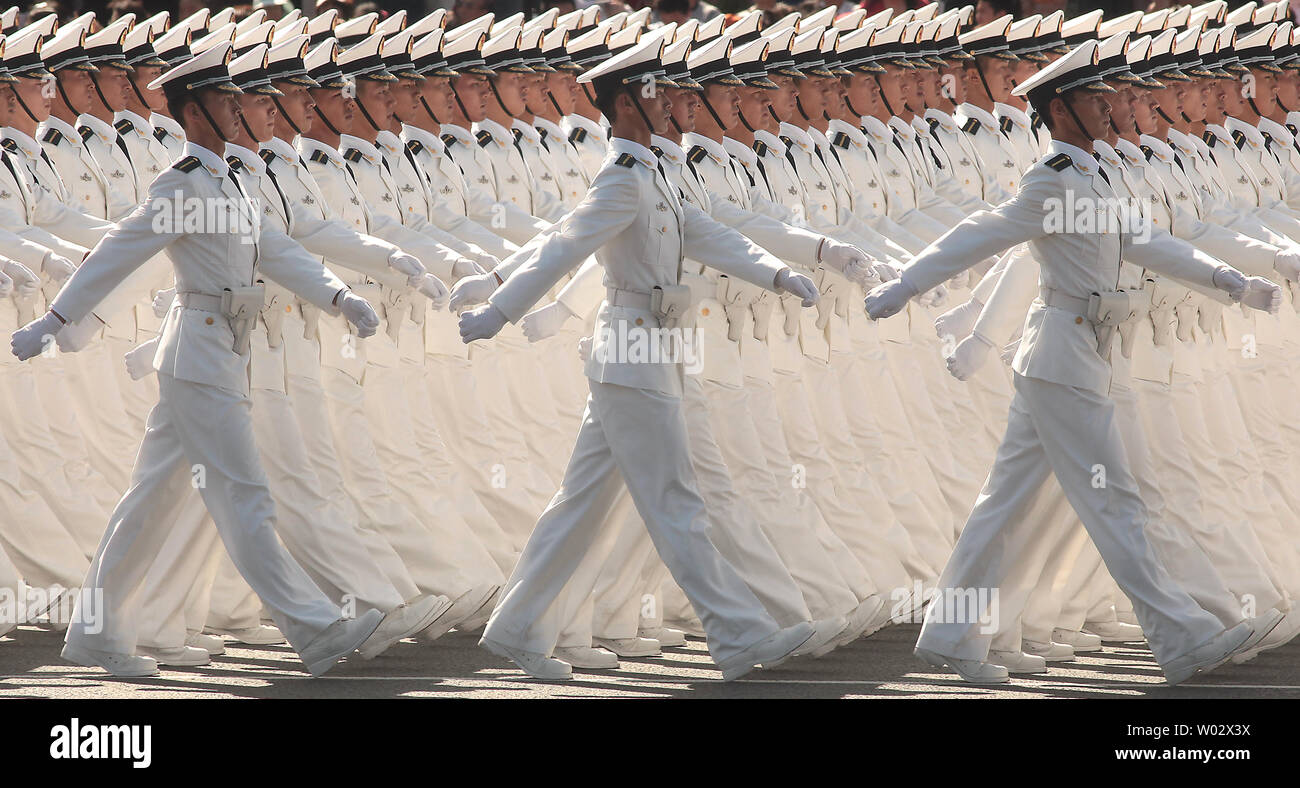 Chinese soldiers participate in a massive military parade celebrating ...