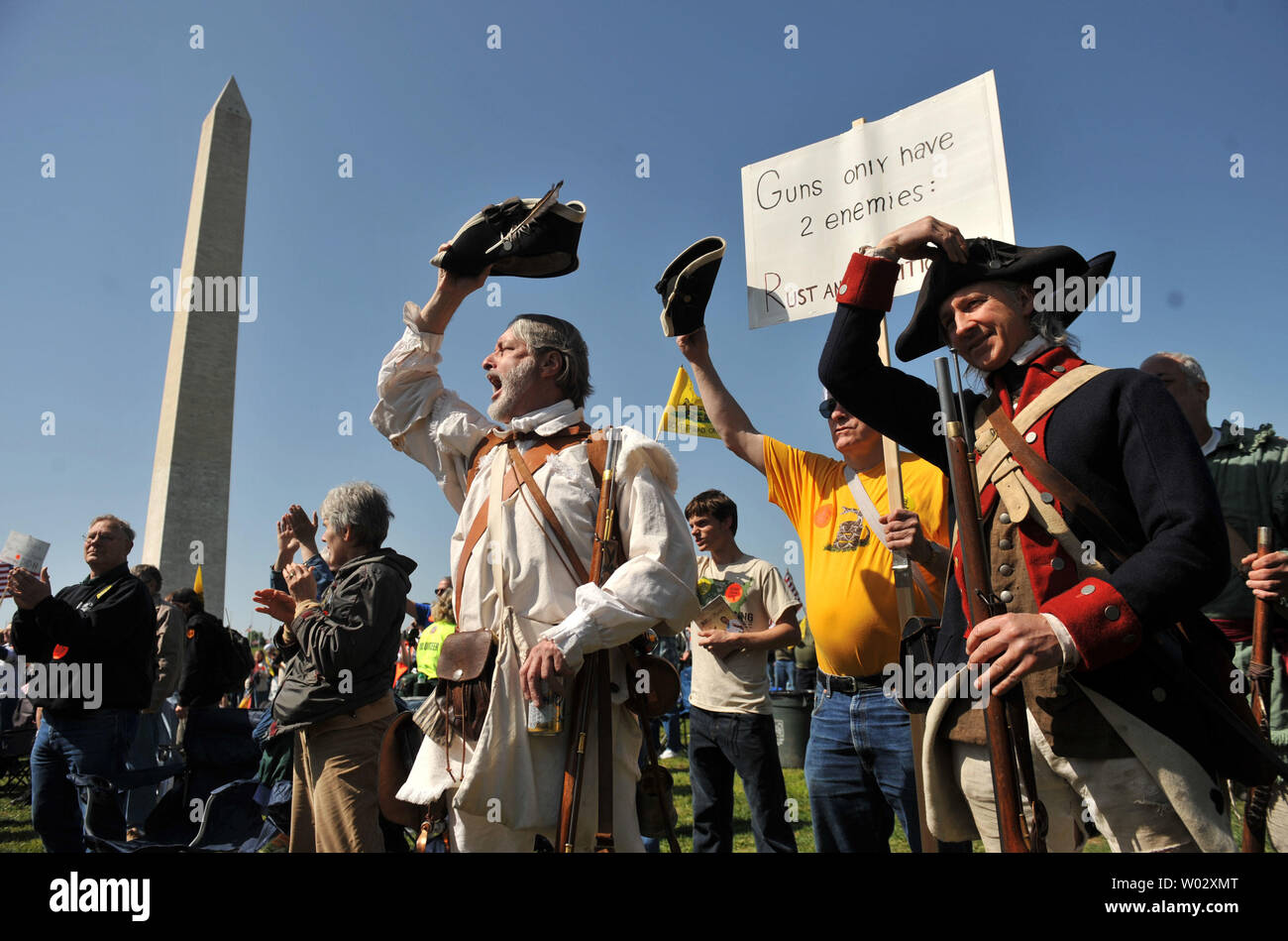 People dressed as Minutemen from the Revolutionary War attend a second ...