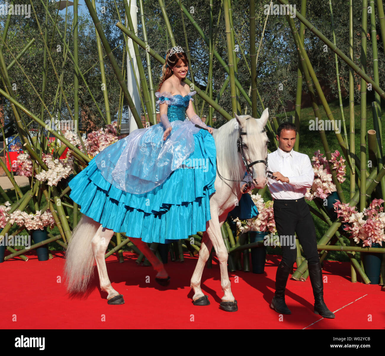 A performer on horseback dressed as a Winx Club character arrives on ...