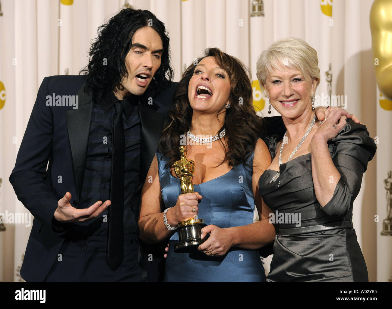 Presenters Helen Mirren and Russell Brand pose with Best Foreign ...
