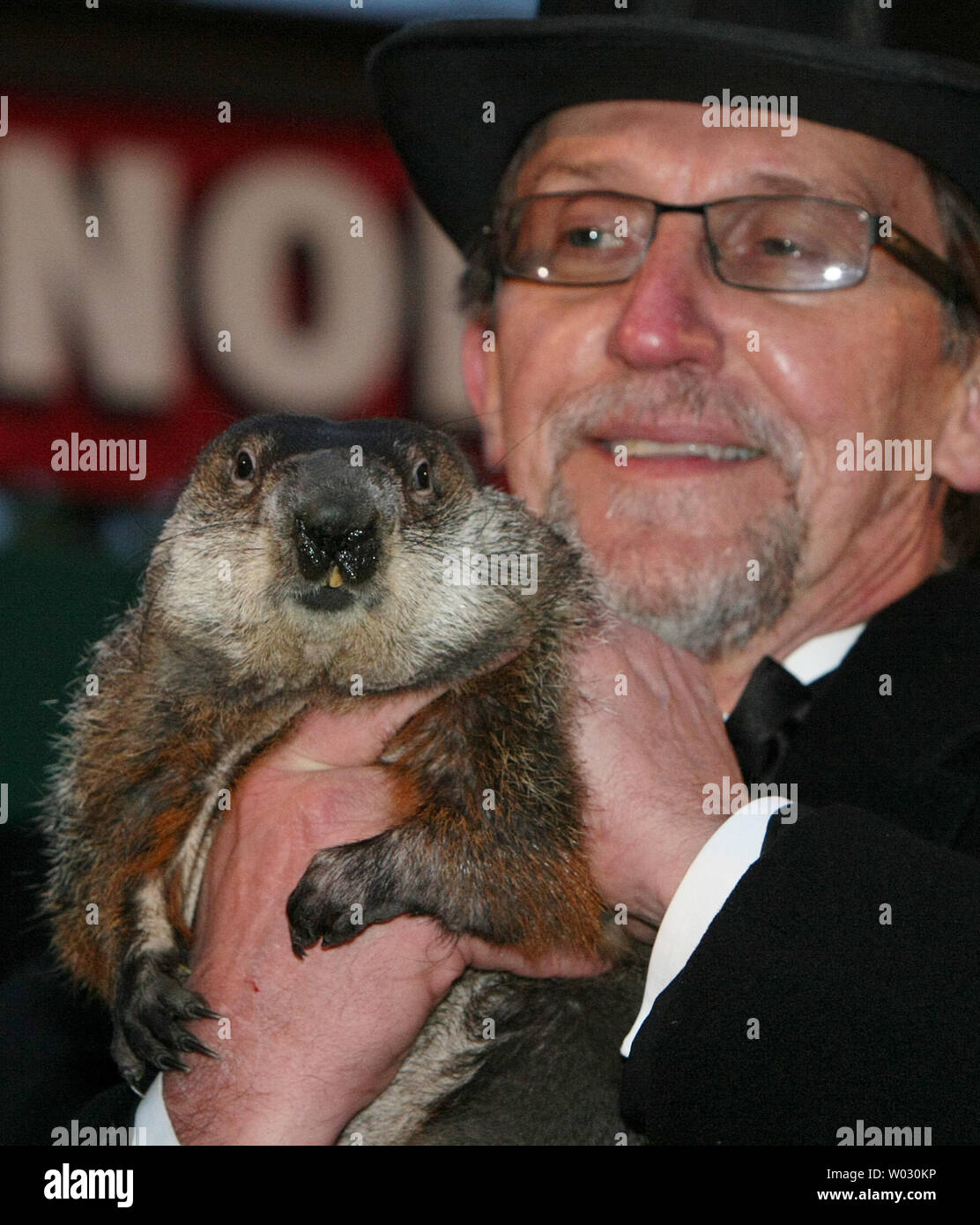 Groundhog handler Ron Ploucha holds weather prognosticating groundhog ...