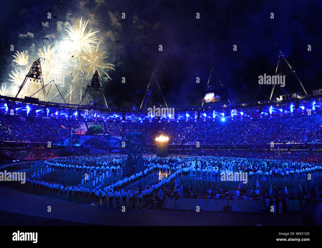 Lights and fireworks play over Olympic Stadium during the opening ...