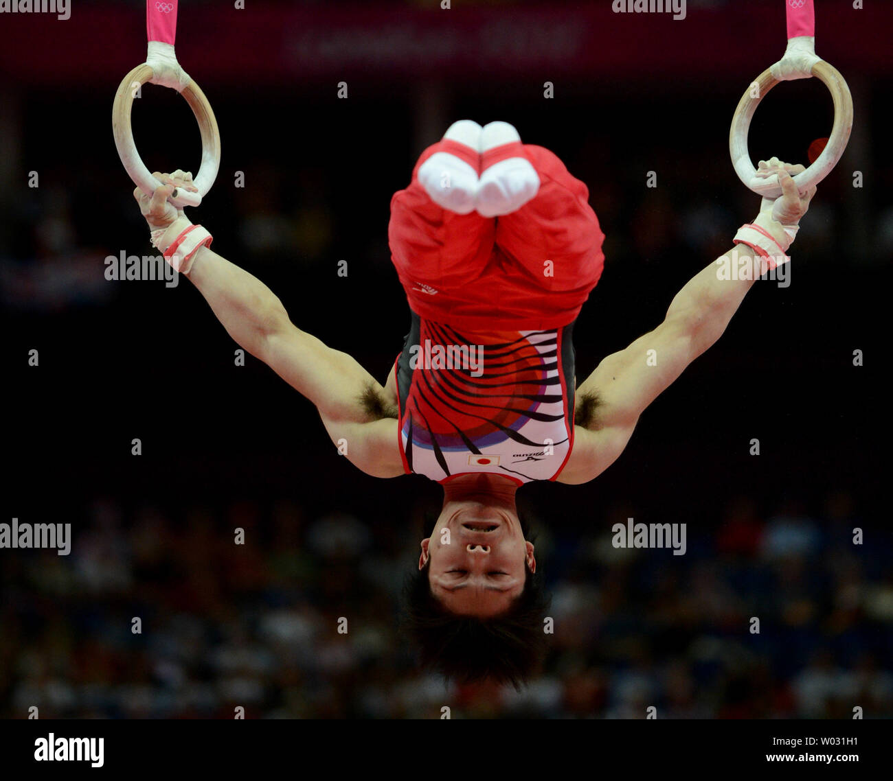 Japan's Kohei Uchimura goes through his routine on the Rings at the Men ...