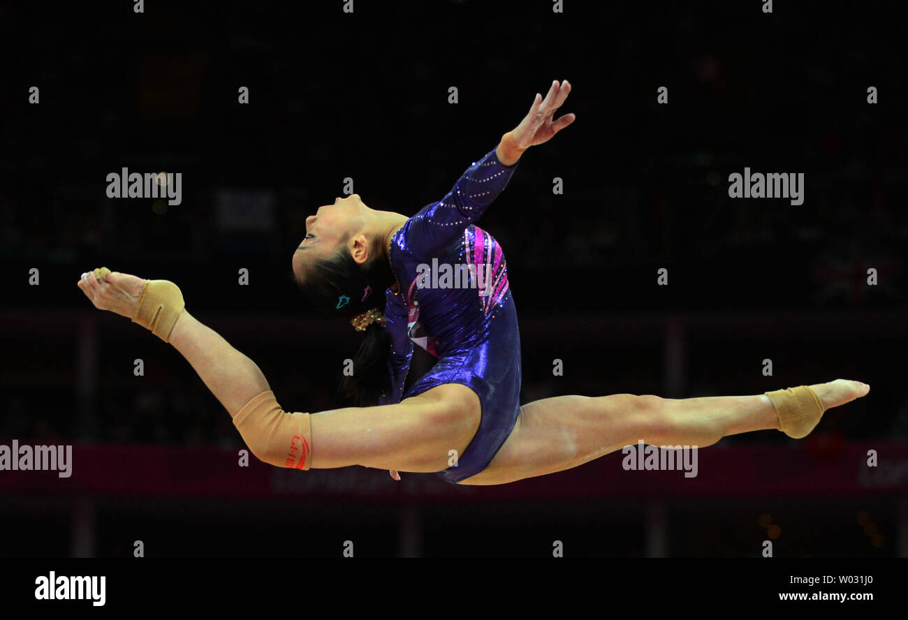 China's Deng Linlin flies in the air in her routine on the Balance Bean ...