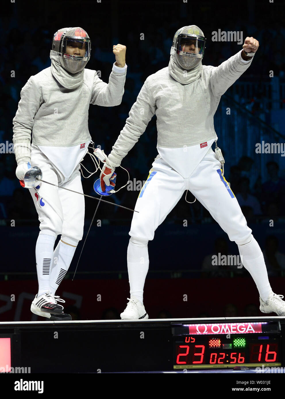 Both Bongil Gu of the Republic of Korea (South Korea), left, and Rares ...