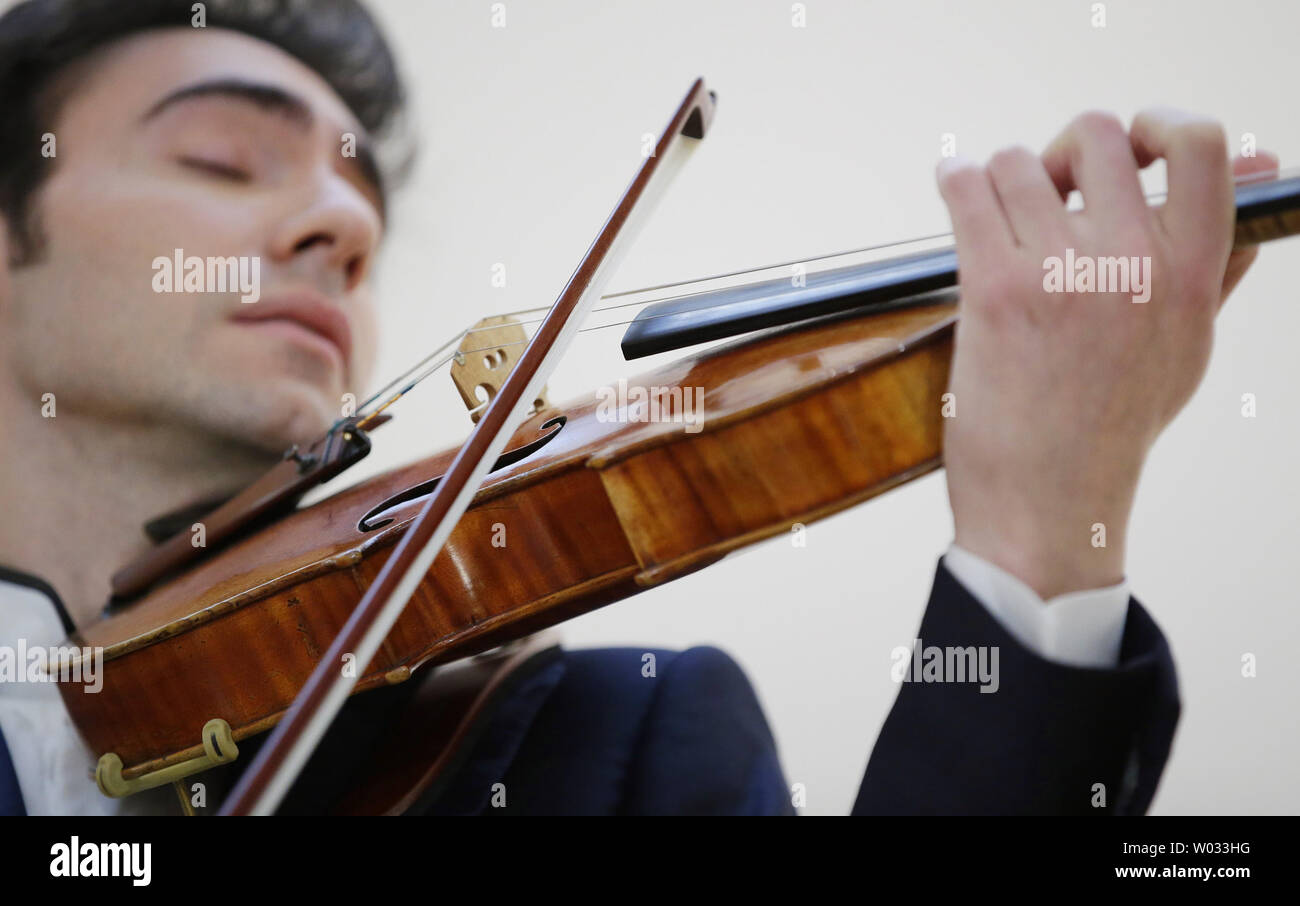 Violist David Aaron Carpenter performs a piece on the Antonio ...