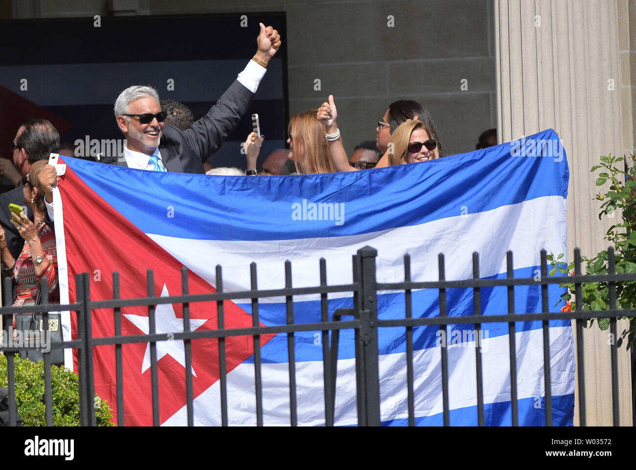 Cuban supporters celebrate inside the recently opened Cuban embassy in ...