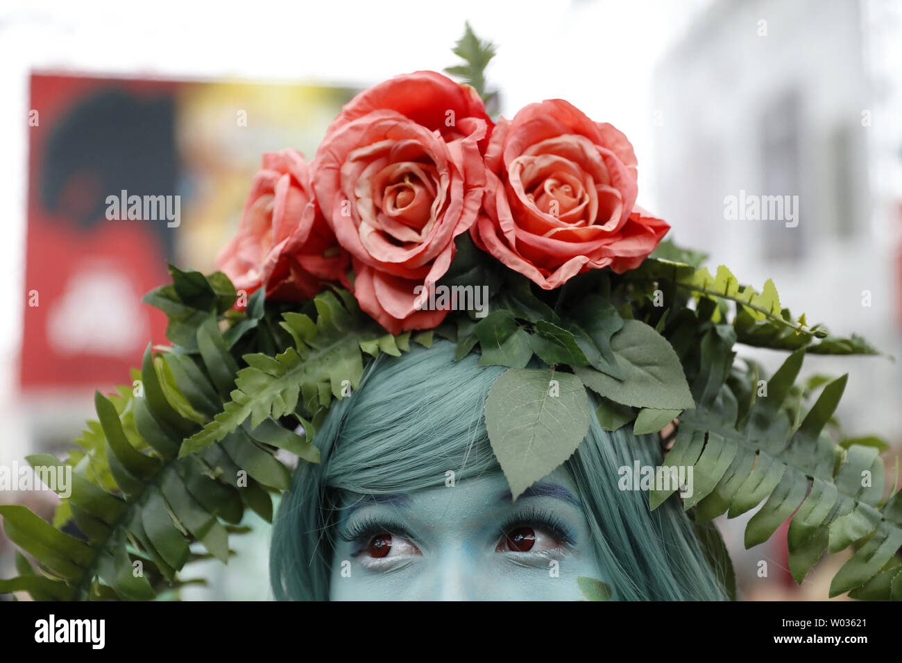 A girl in costume poses for a photo at New York Comic Con at the Jacob ...