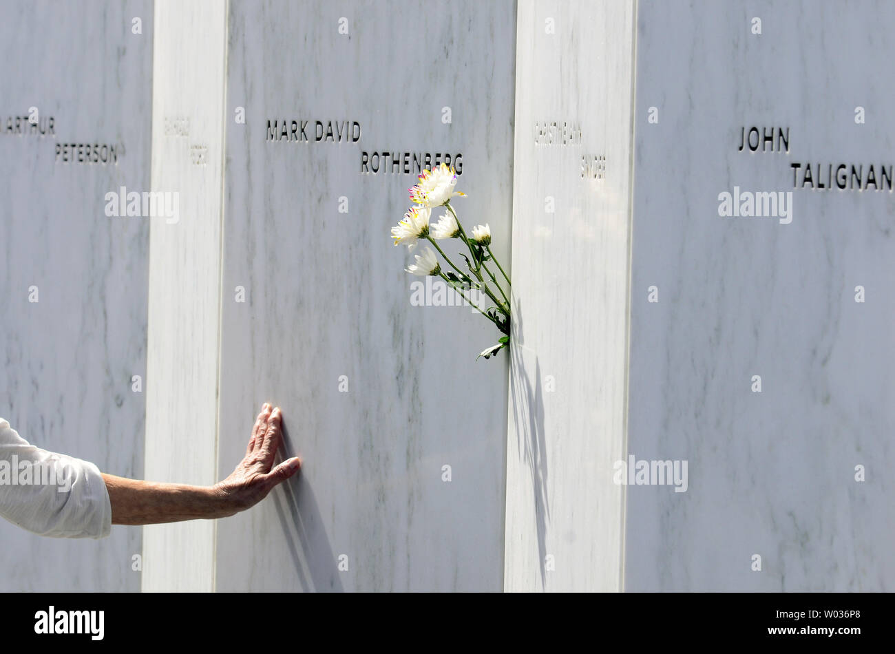 A visitor to the Wall of Names at the Flight 93 National Memorial ...