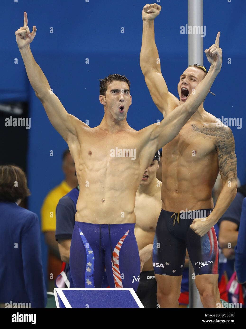 Americans Michael Phelps (L) and Caeleb Dressel celebrate winning gold ...