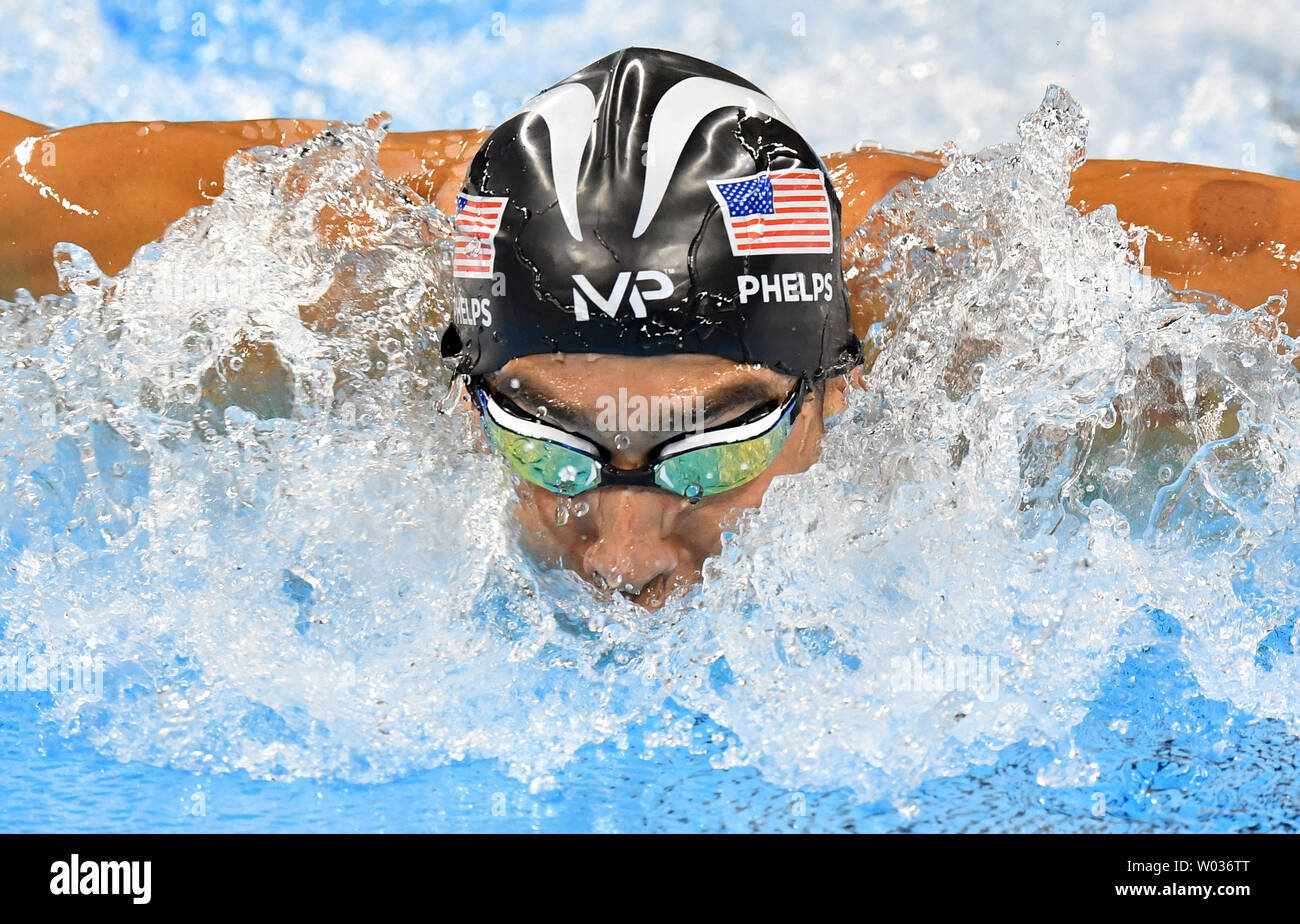 Michael Phelps of the United States competes and wins the gold medal in ...