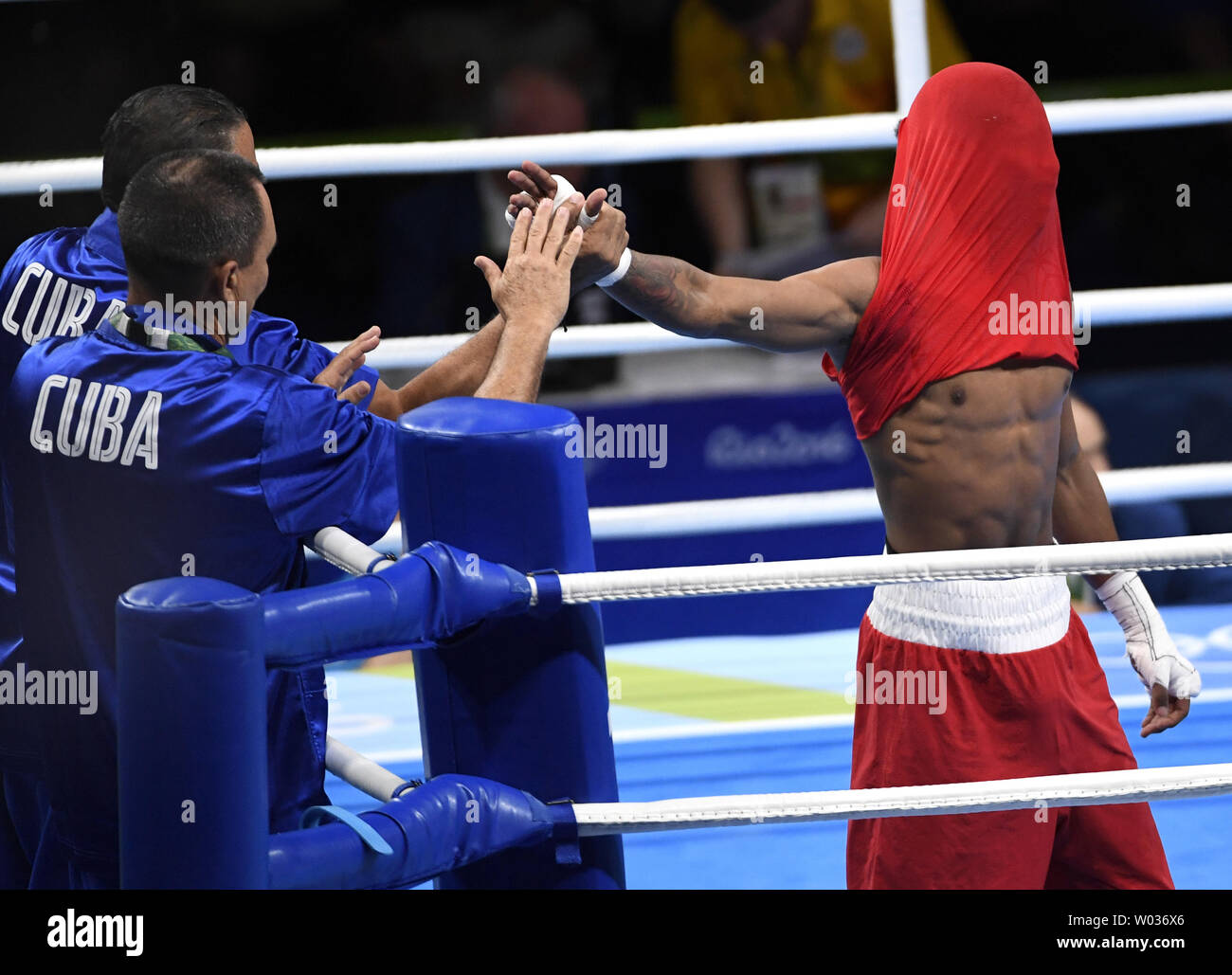 Shirt pulled over head hi-res stock photography and images - Alamy