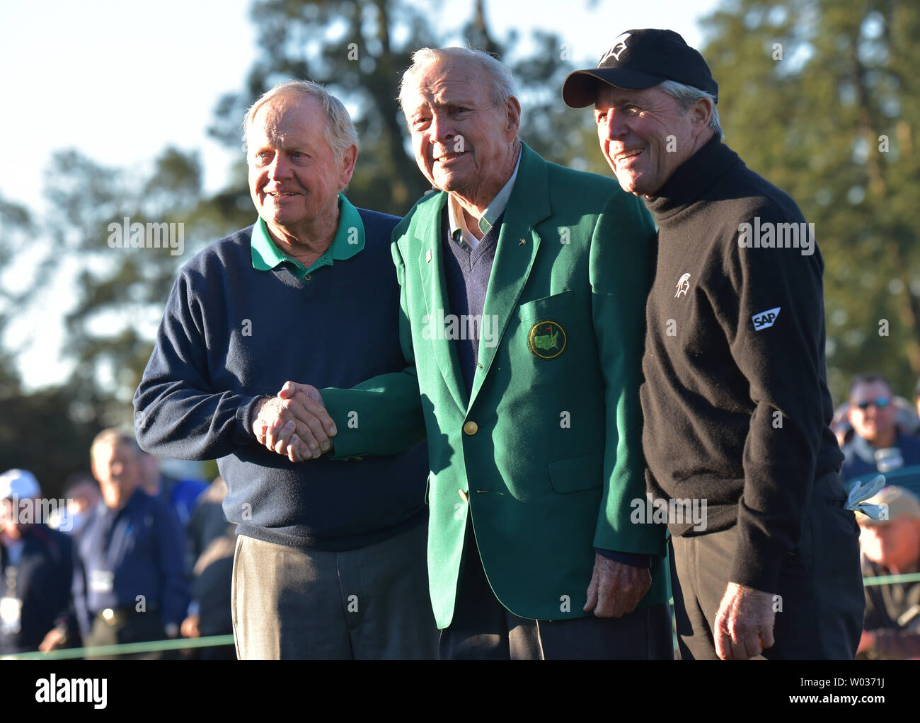 Honorary starters Jack Nicklaus, Ar­nold Pal­mer and Gary Player stand ...