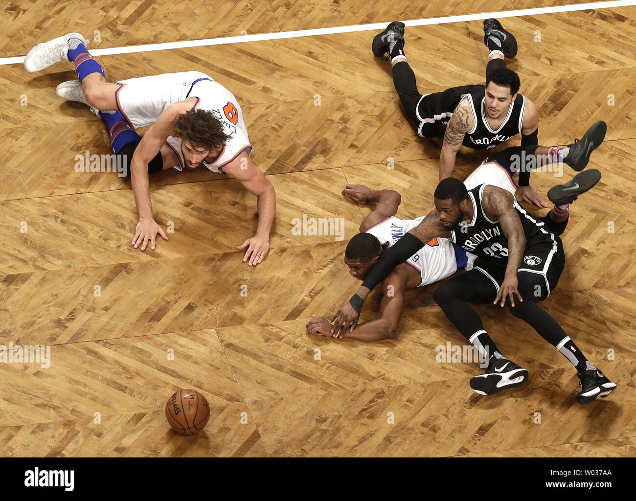 New York Knicks Robin Lopez, Langston Galloway, Brooklyn Nets Willie ...