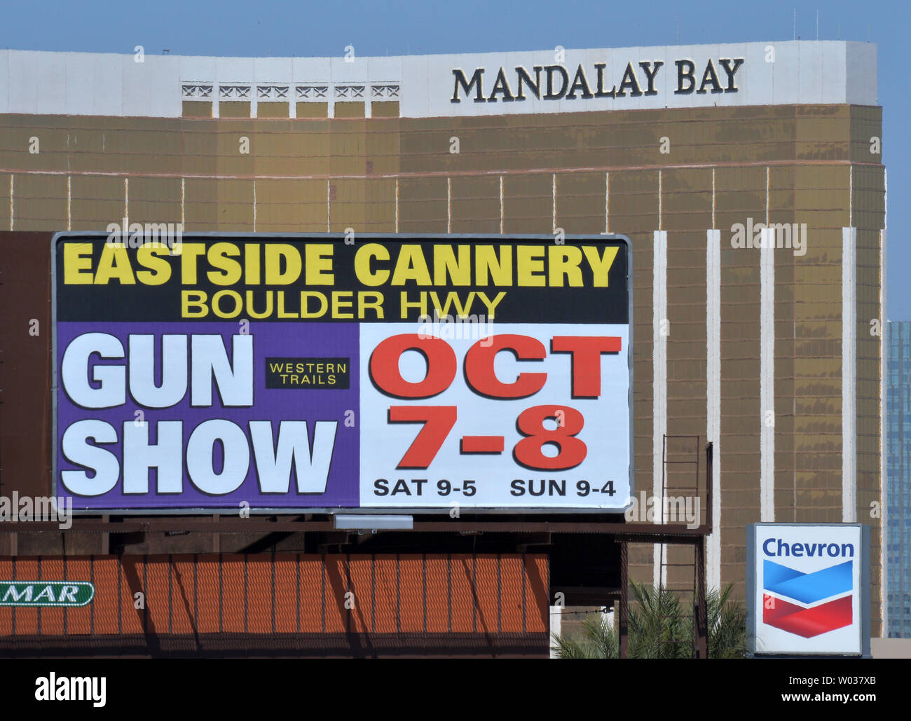 A billboard advertising an upcoming gun show can be seen near the 32nd ...