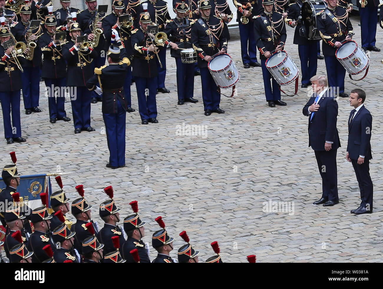 U.S. President Donald Trump (L) and French President Emmanuel Macron ...